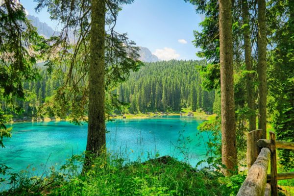 Sass Pordoi and Carezza Lake in the Dolomites